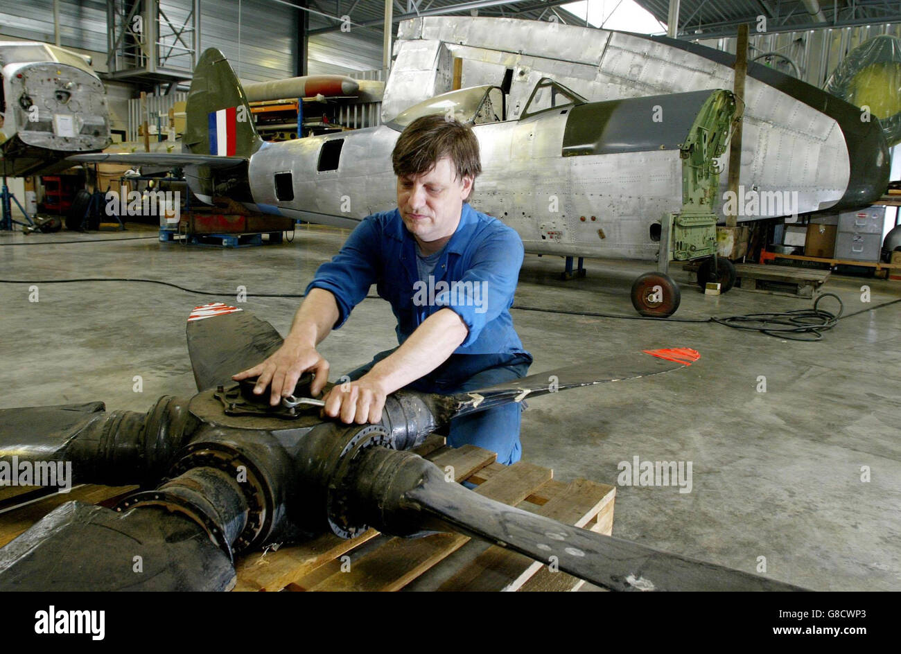 Mike Terry, restoration engineer with the Aircraft Restoration Company ...