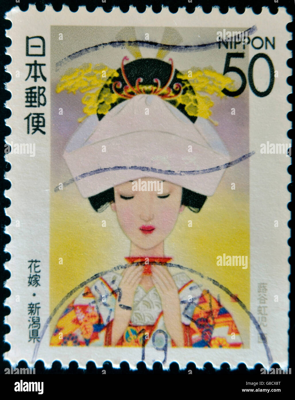 JAPAN - CIRCA 1997: A stamp printed in Japan shows a bride, circa 1997 ...
