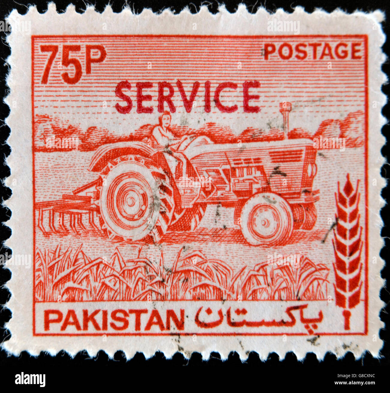 PAKISTAN - CIRCA 1970: A stamp printed in Pakistan shows woman tractor ...