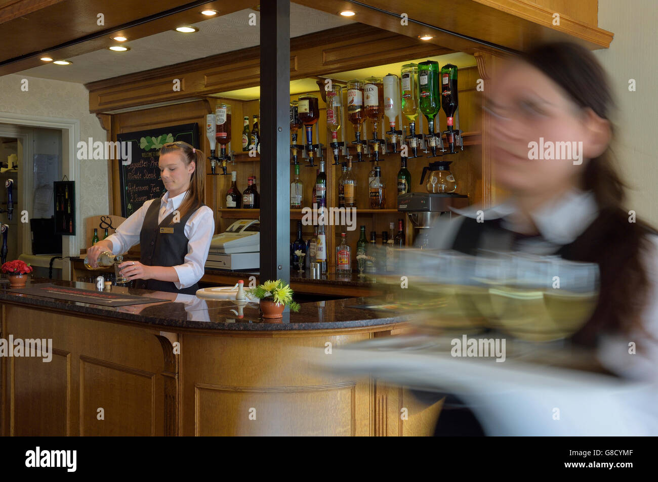Barmaid waitress hi-res stock photography and images - Alamy
