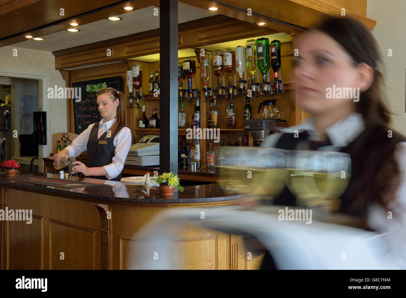 Restaurant uk waitress serving hi-res stock photography and images - Alamy