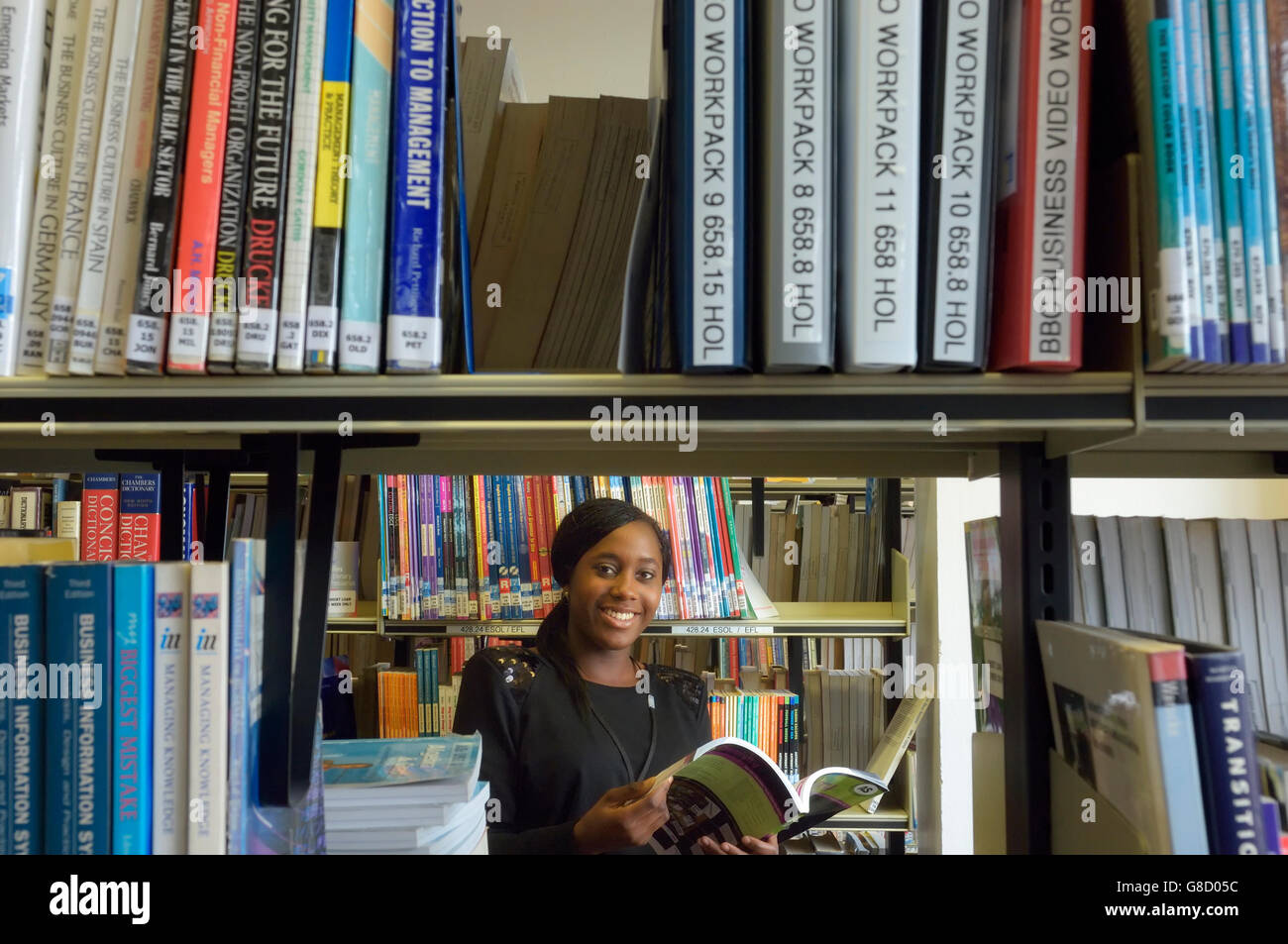 Female student browsing in the school library. England. UK Stock Photo ...