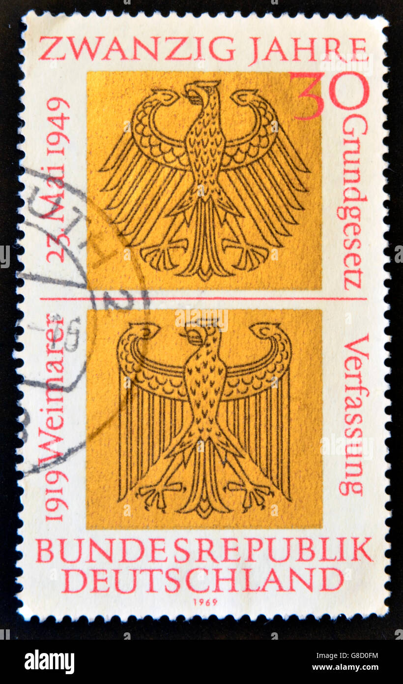GERMANY - CIRCA 1969: A stamp printed in Germany celebrates 50 years of ...