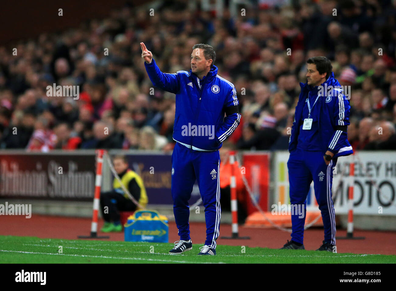 Chelsea first team coach Steve Holland (left) gestures on the touchline ...