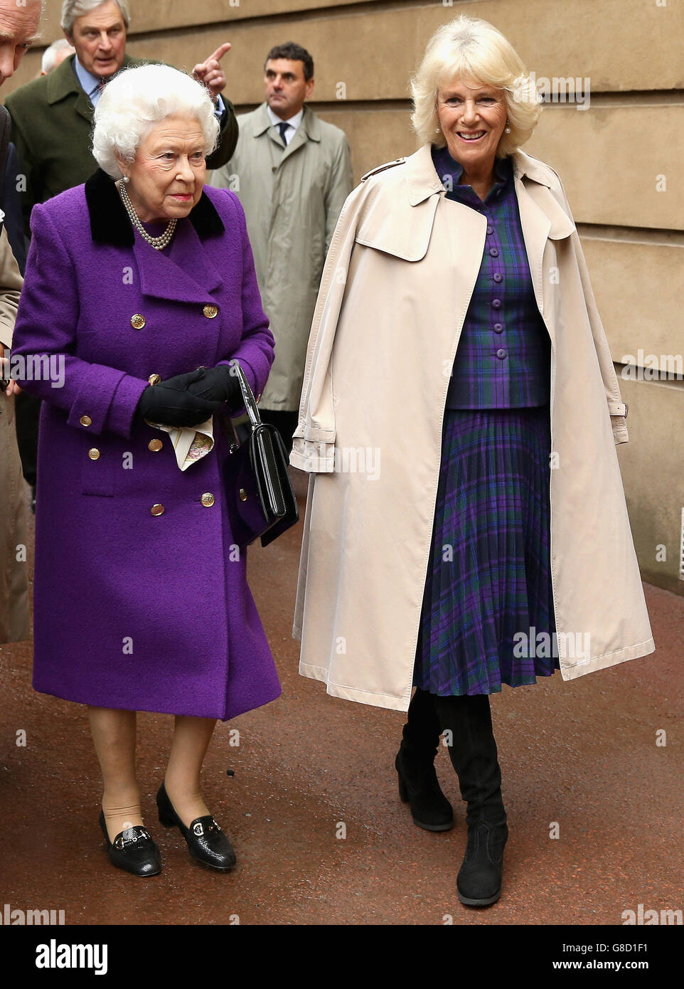 Duchess of Cornwall and Queen Elizabeth II attend a horse whispering ...