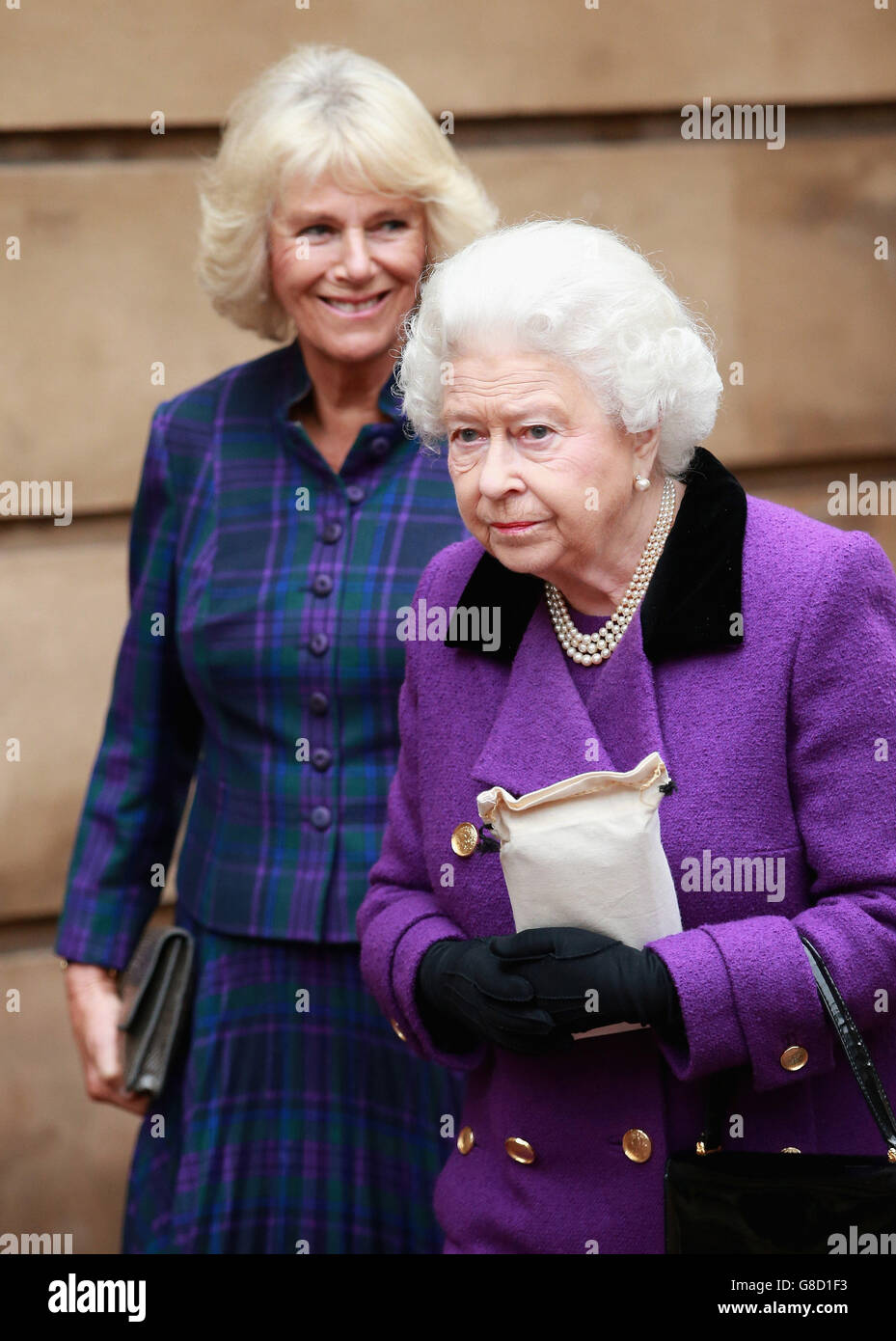 Duchess of Cornwall and Queen Elizabeth II attend a horse whispering ...