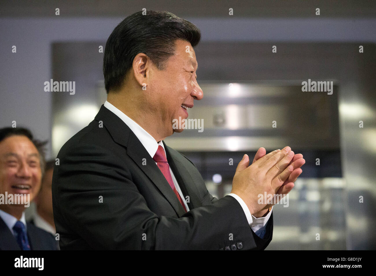 China's president Xi Jinping is shown around the offices of Huawei ...