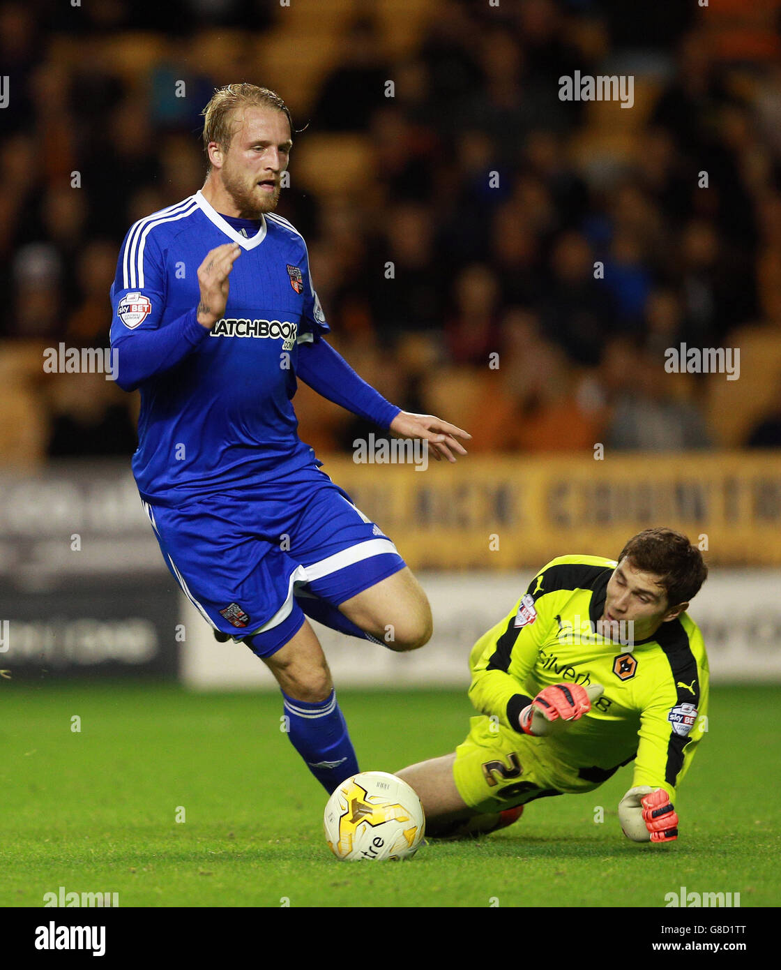 Brentford's Philipp Hofmann goes round Wolverhampton Wanderers ...