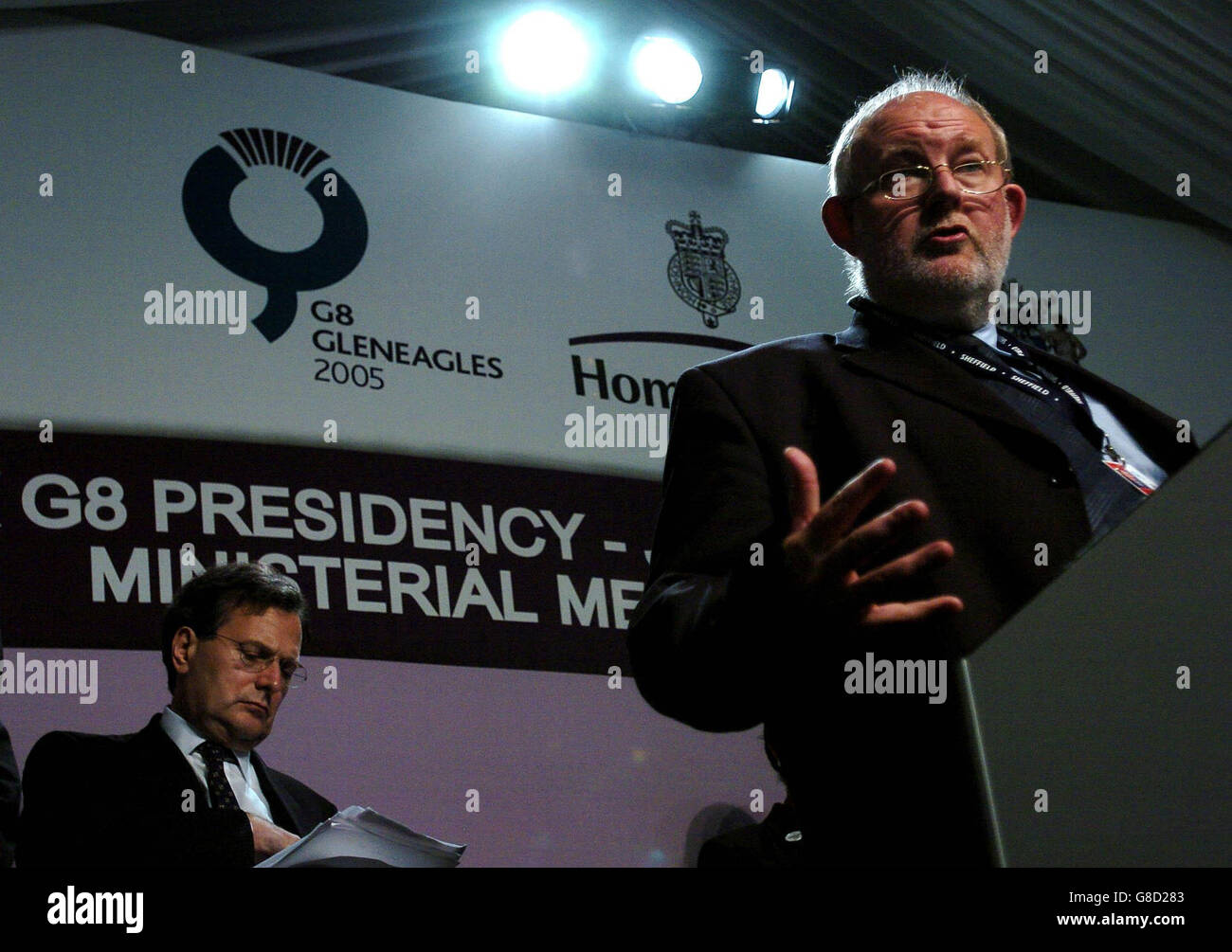 Home Secretary Charles Clarke, makes a closing speech alongside ...