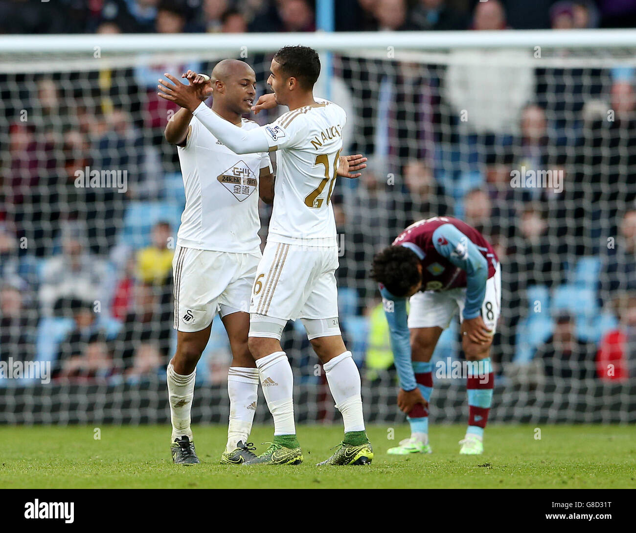 Swansea City's Andre Ayew (left) celebrates with Kyle Naughton after ...