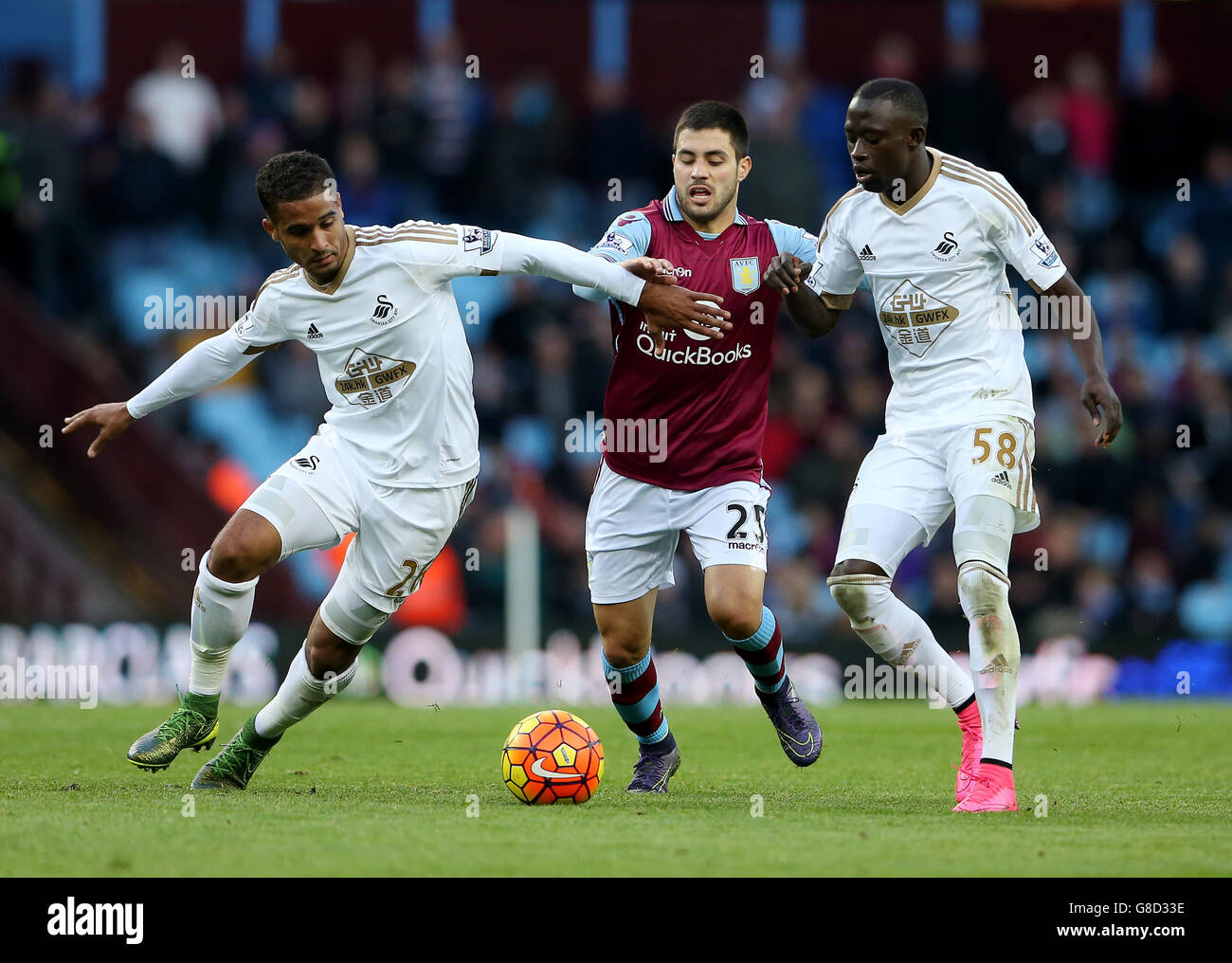 s Kyle Naughton (left) and Modou Barrow (right) during the Barclays ...