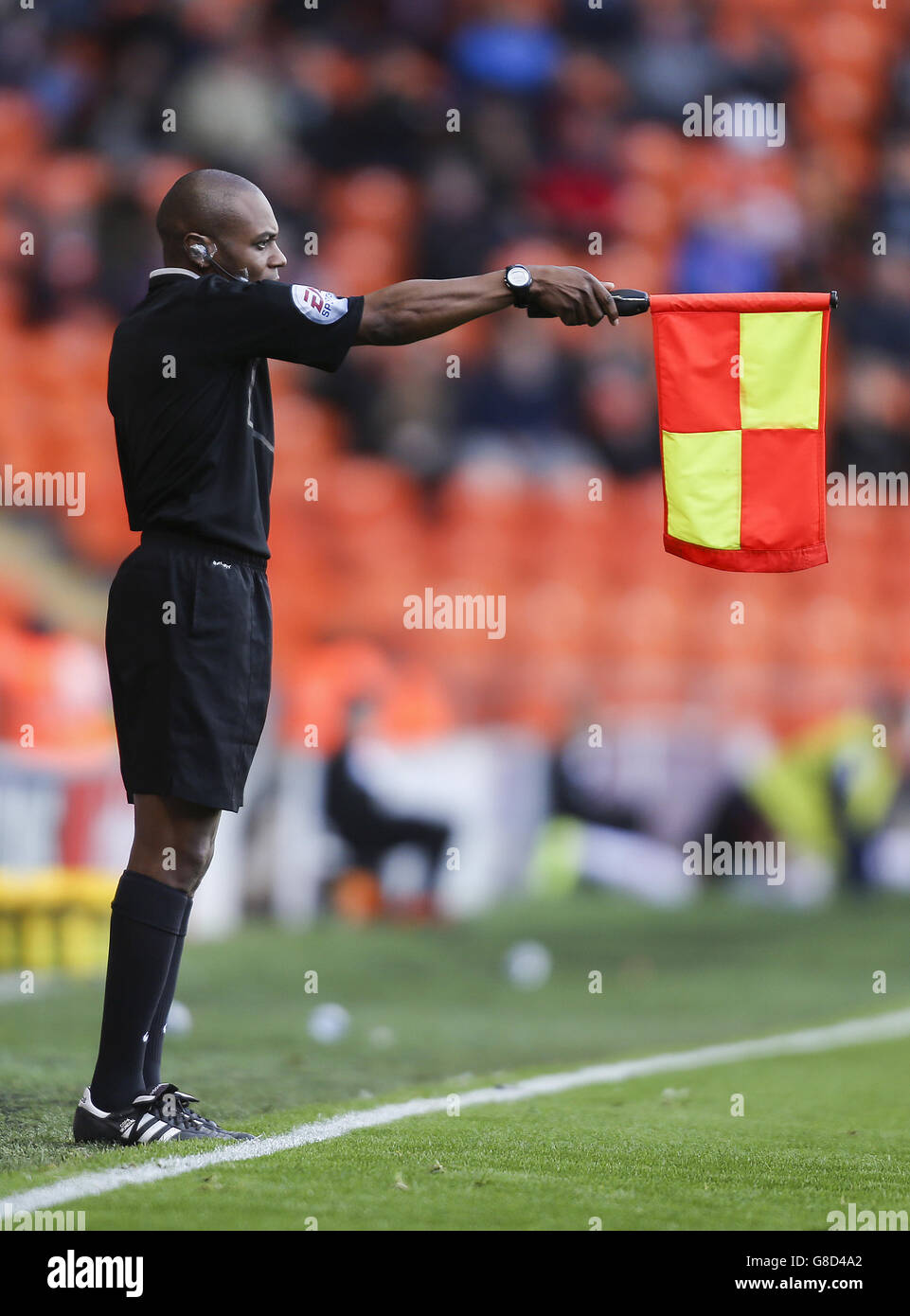 Football full length linesman flagging flag hi-res stock photography ...