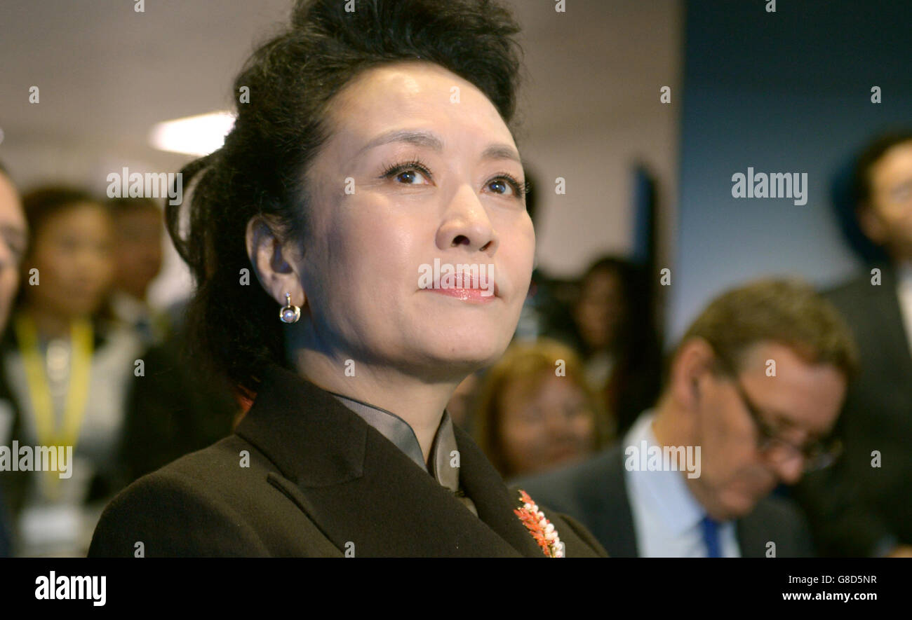 Madame Peng Liyuan listens to Professor Yike Guo (not pictured) during ...