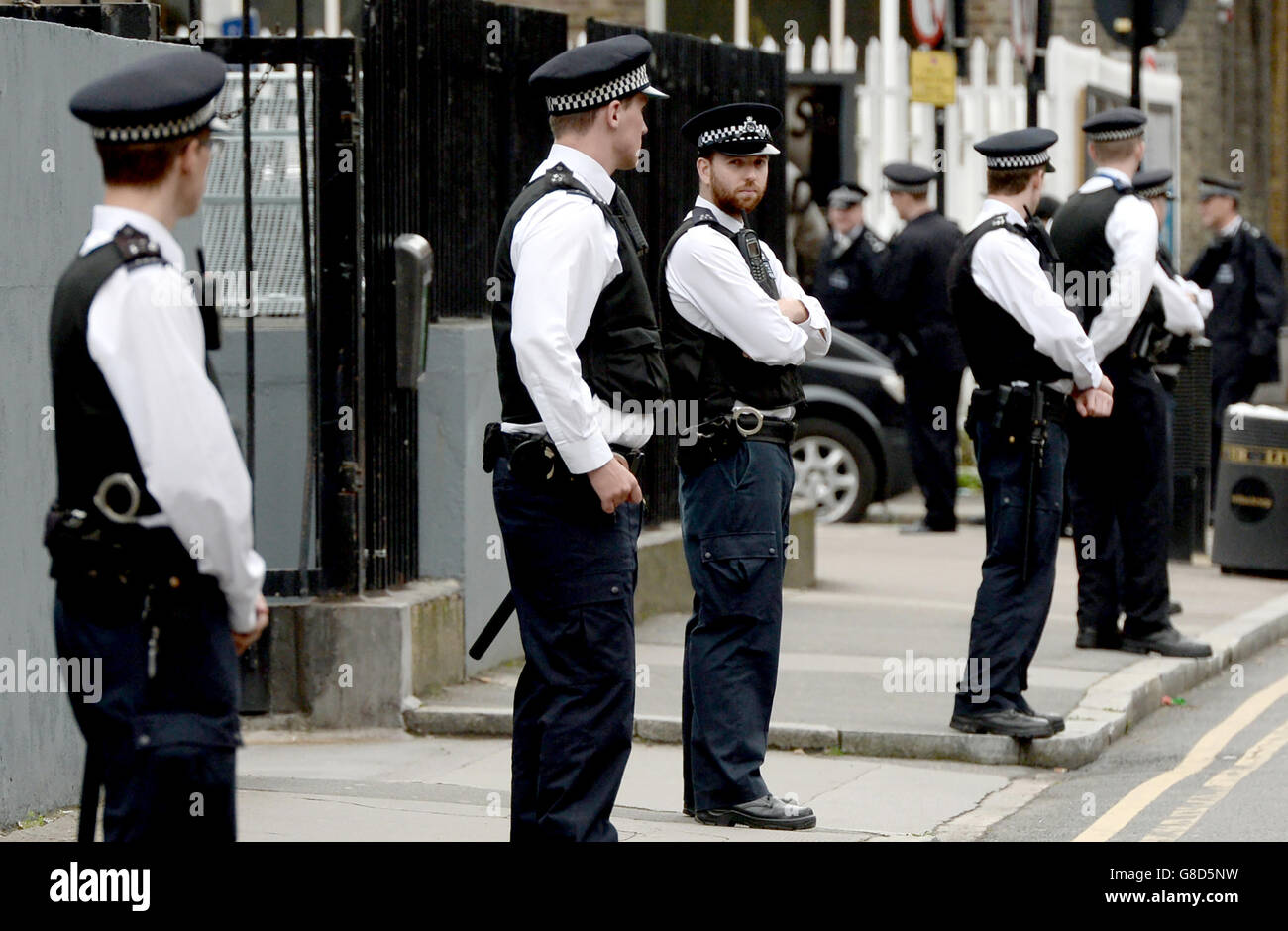 Police officers line the streets as Chinese President Xi Jinping and ...