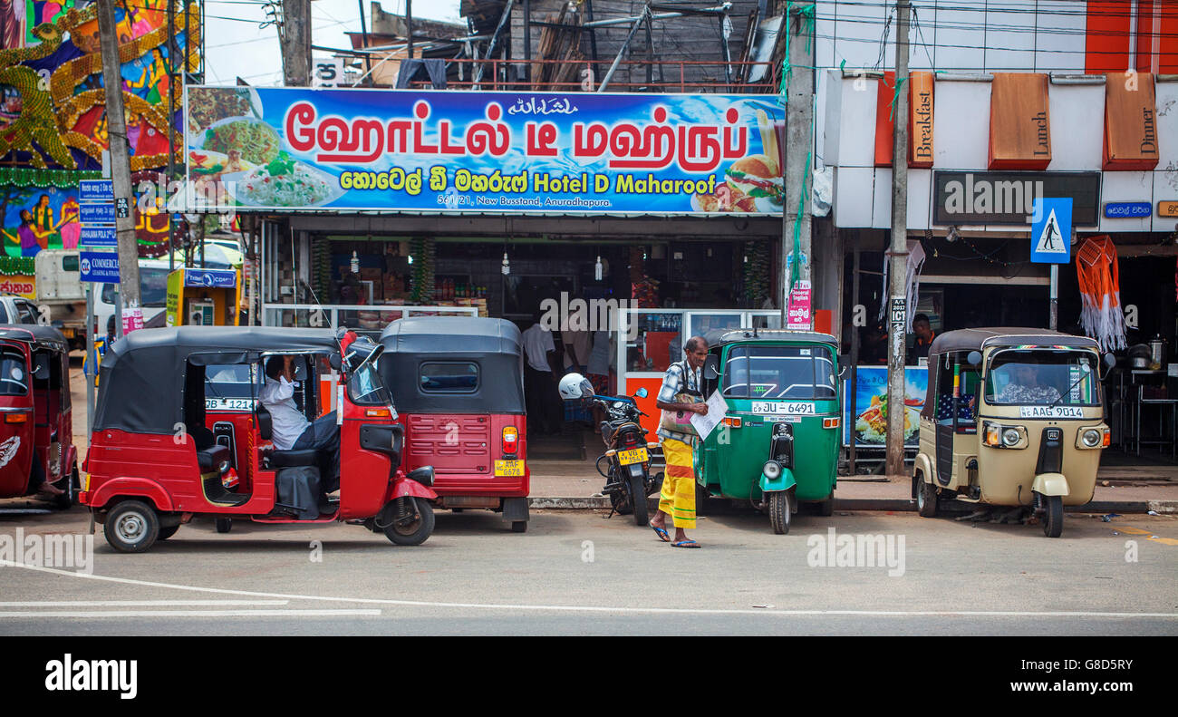 Tuk-Tuks parked outside shop Sri Lanka Stock Photo - Alamy
