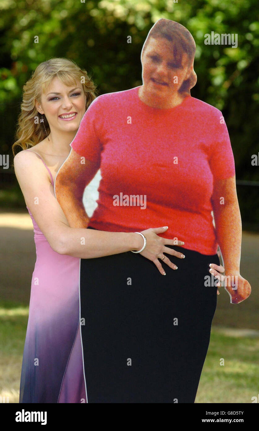 Lyn Owen, a nurse from St Helens in Merseyside, stands with a cardboard ...