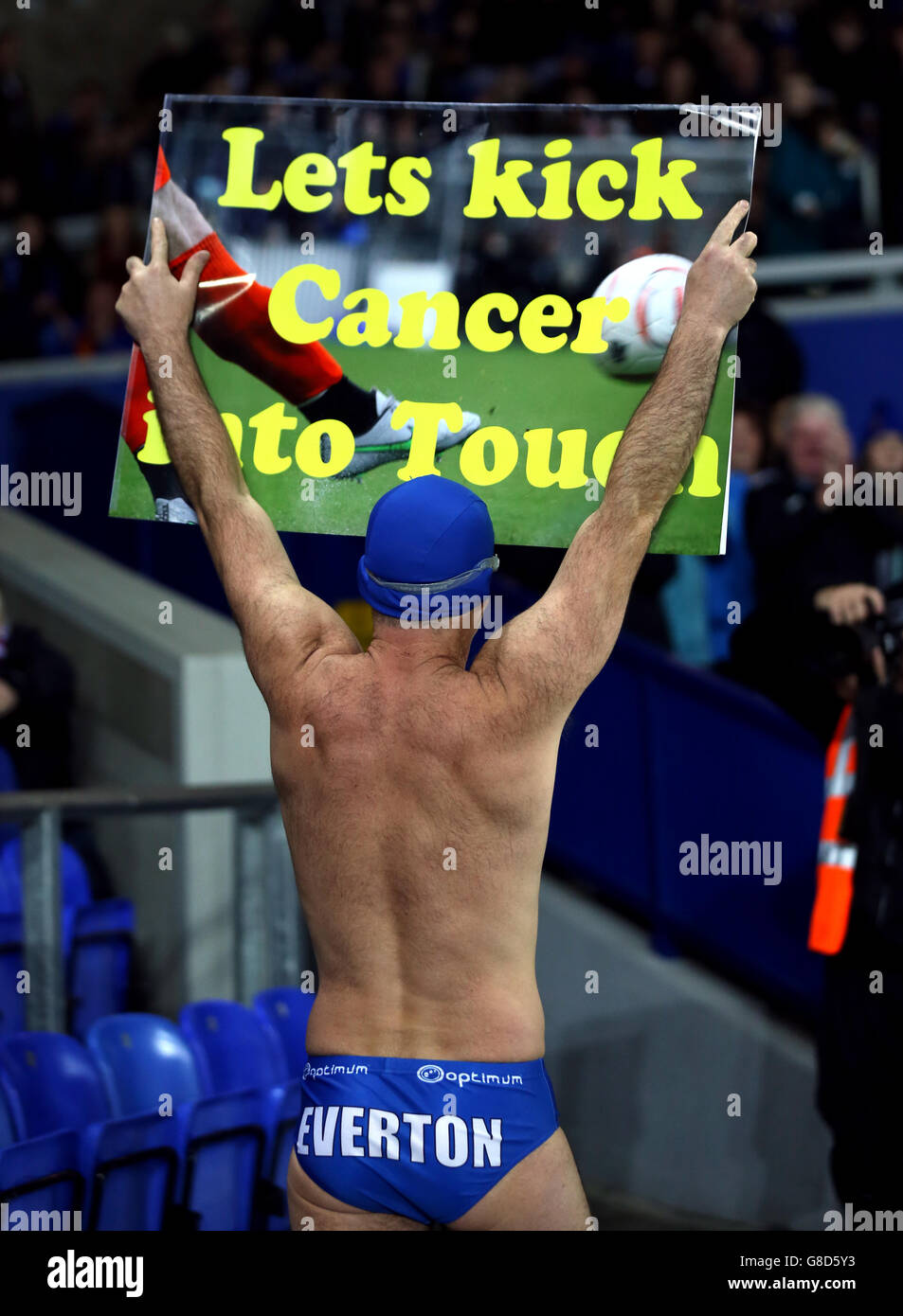 Michael Cullen wears a swimming cap and trunks to raise money for ...