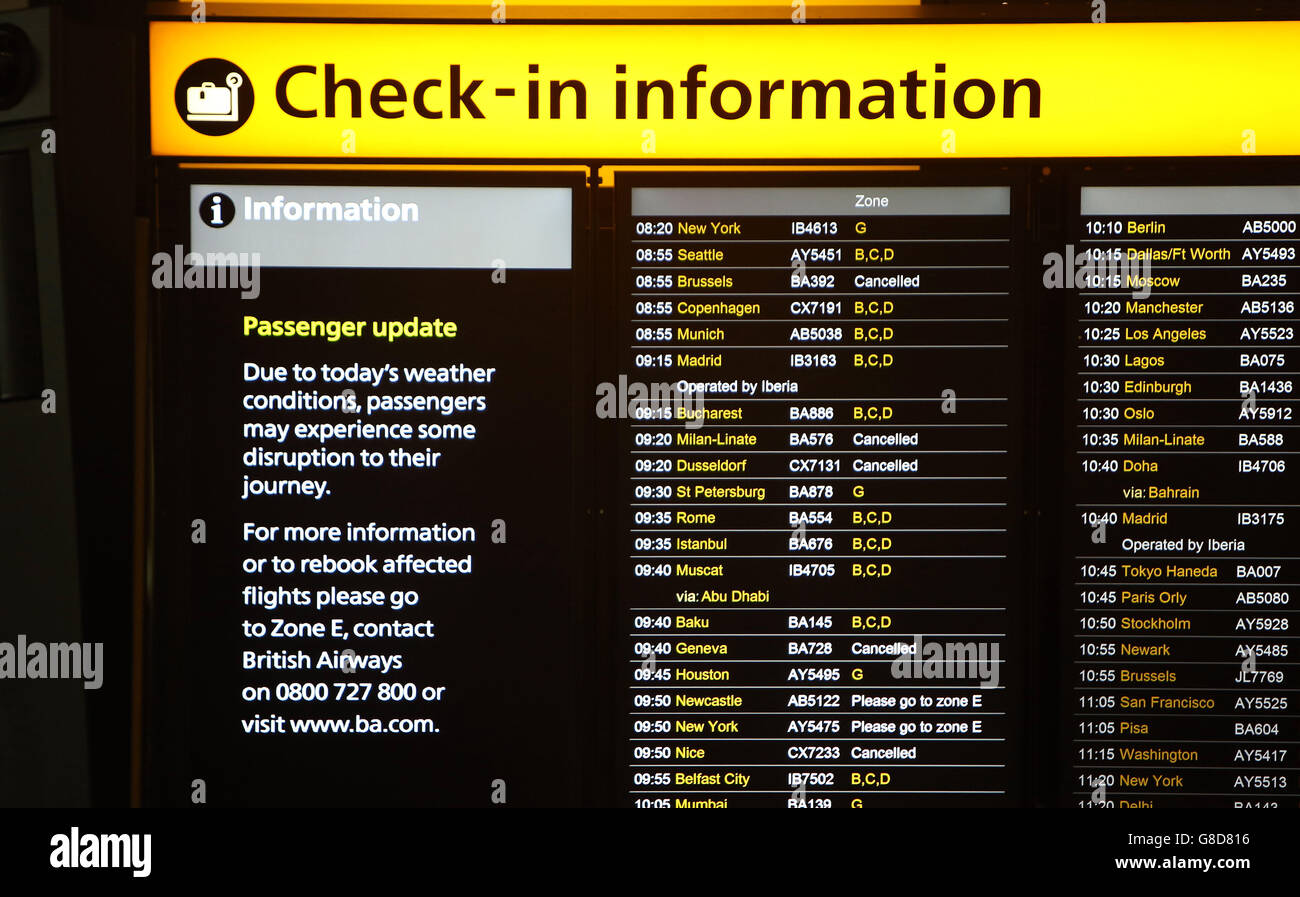 The check in boards in terminal 5 of heathrow airport hi-res stock ...