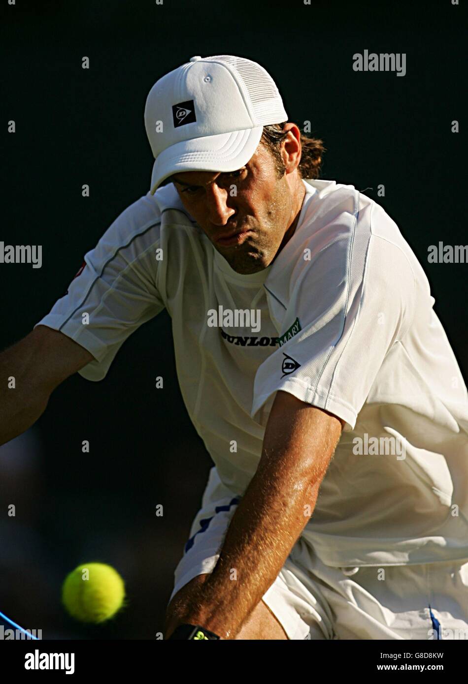 Greg Rusedski on his way to his defeat by Joachim Johansson Stock Photo ...
