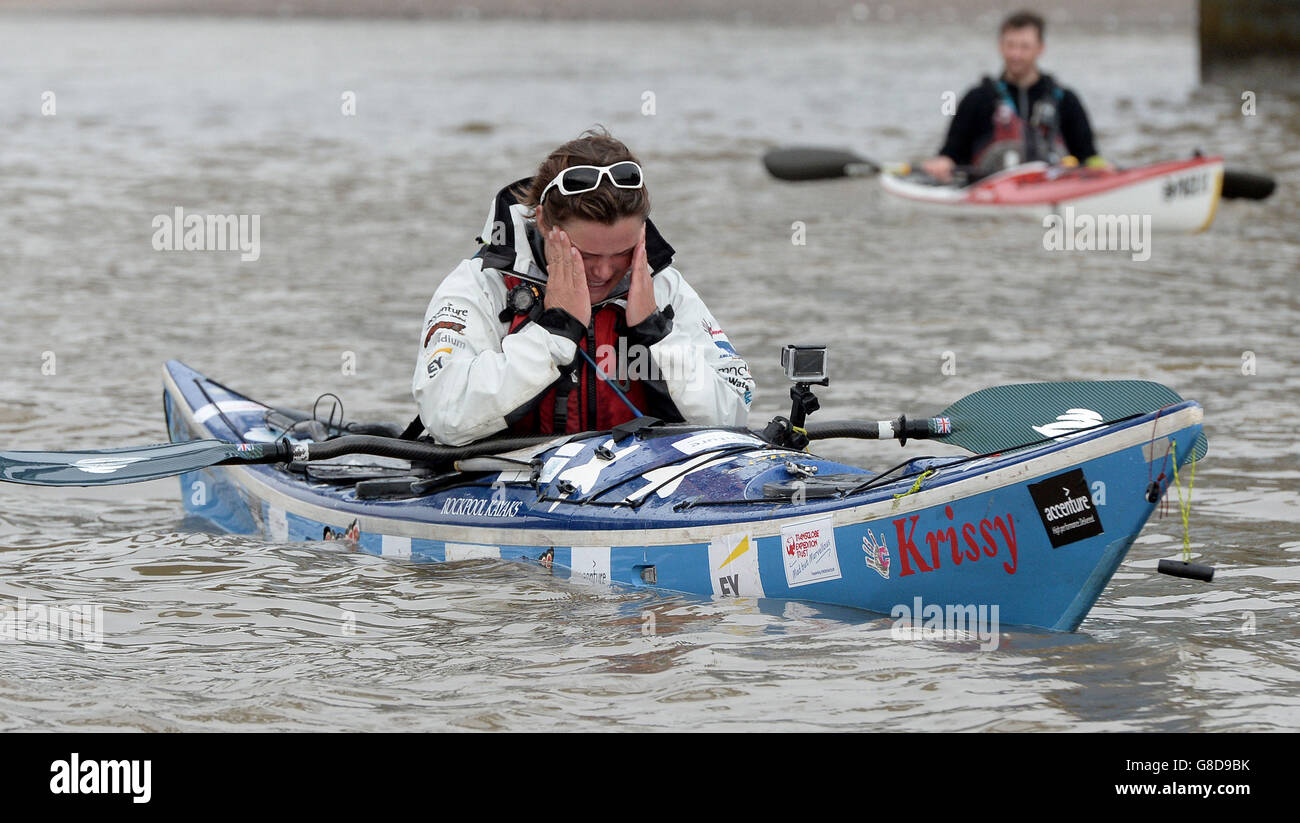 British adventurer Sarah Outen shows her emotions as she kayaks under ...