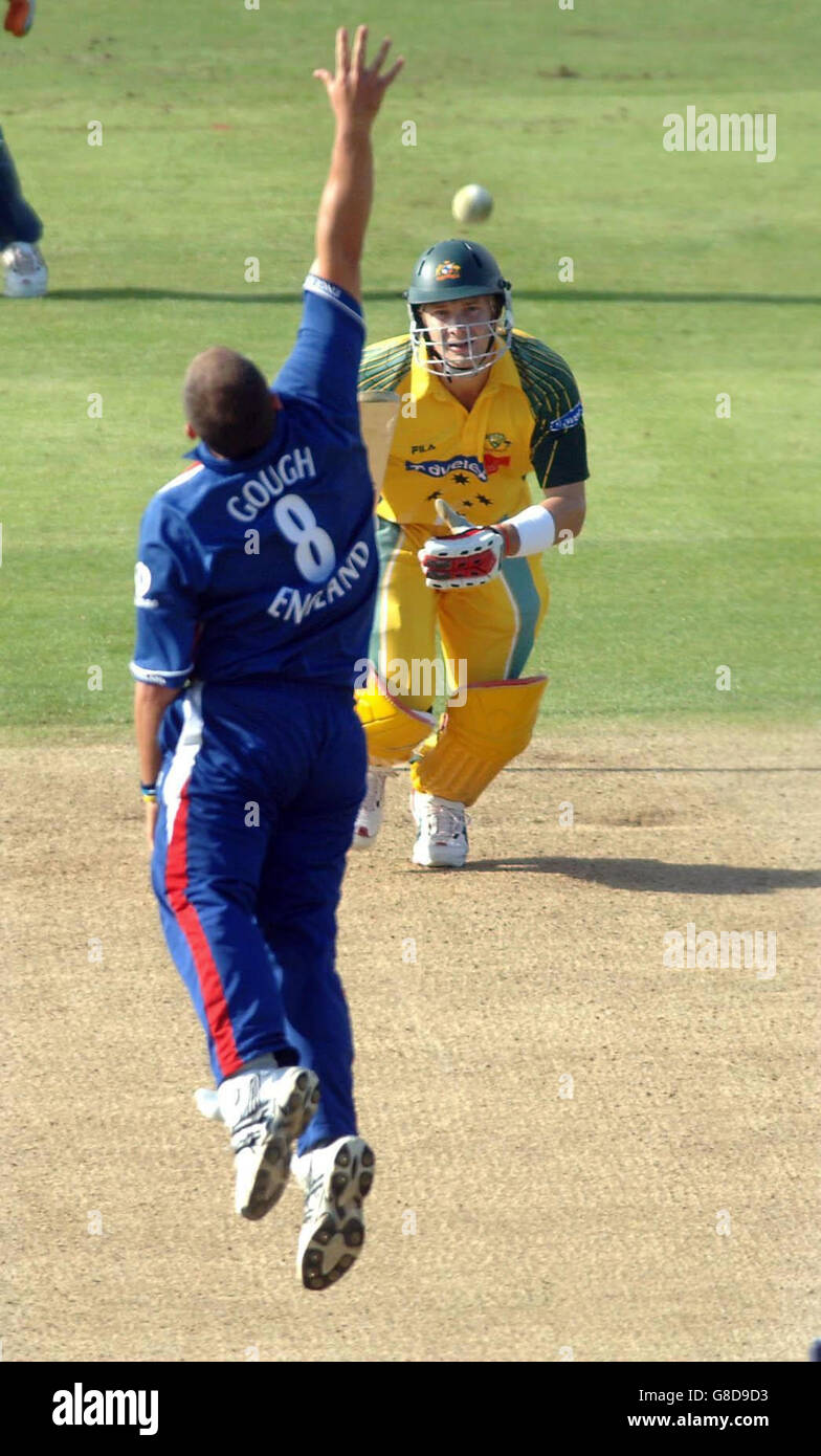 England's Darren Gough tries to catch from Australia's Shane Watson ...