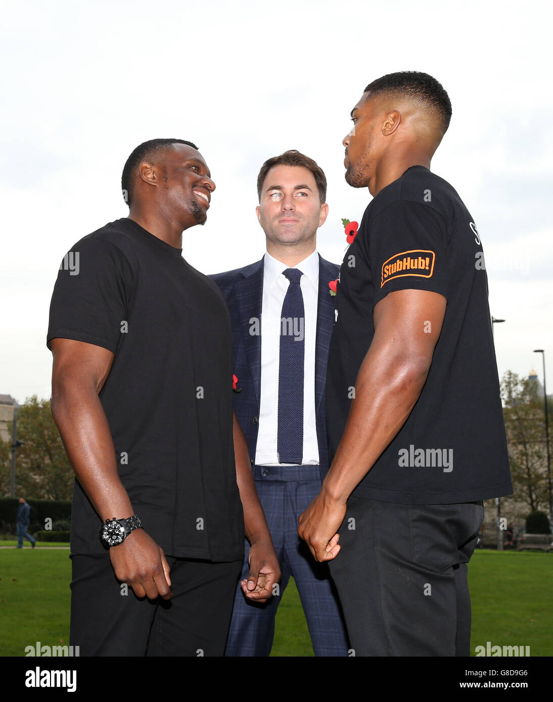 Dillian Whyte (left), boxing promoter Eddie Hearn (centre) and Anthony ...