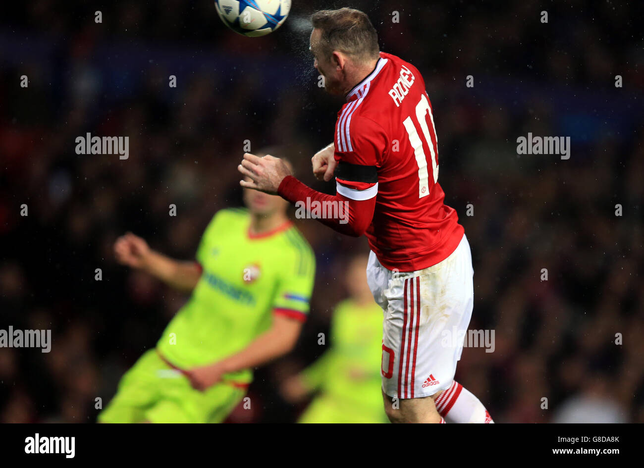 Manchester United's Wayne Rooney scores his side's first goal of the ...