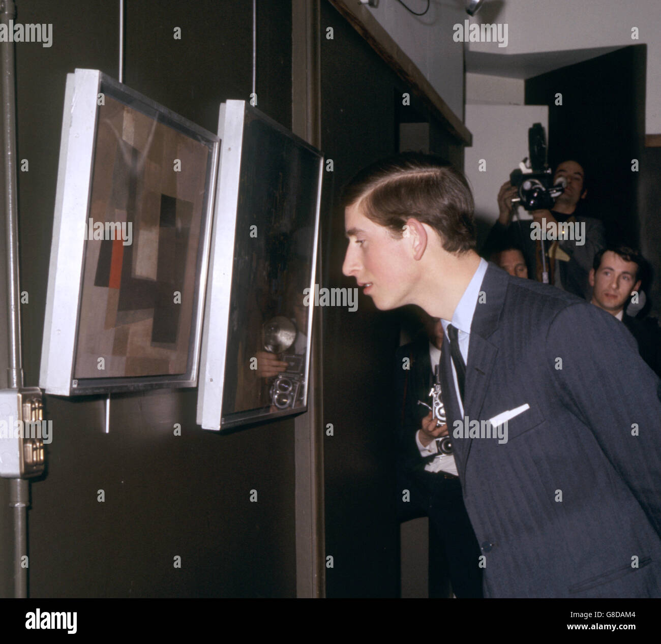 Prince Charles looks at a wall display at Aberystwyth University ...