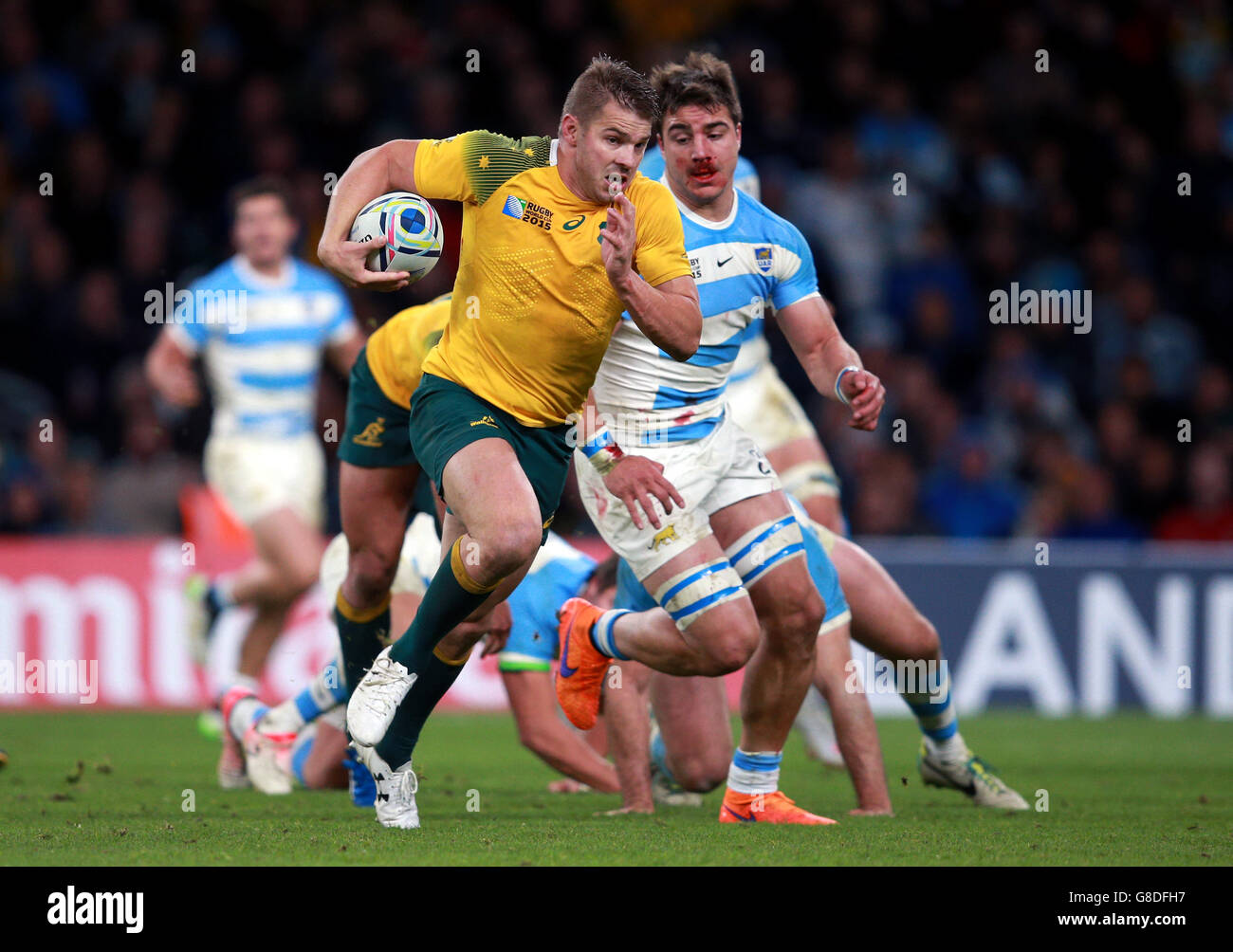 Australia's Drew Mitchell makes a break, leading to his side's third ...
