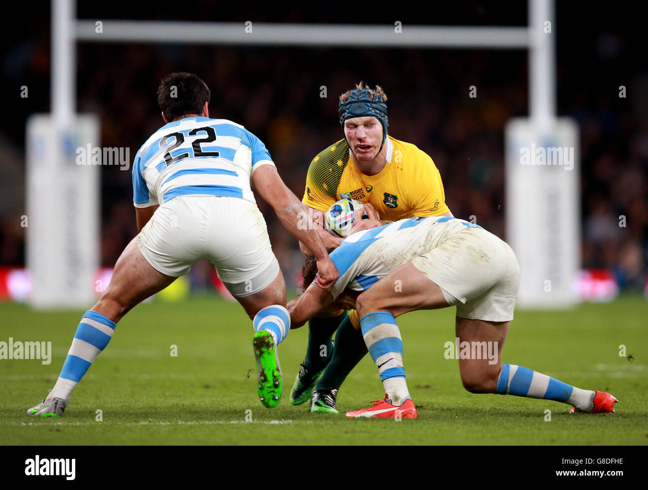 Australia's David Pocock gets tackled during the Rugby World Cup, Semi ...