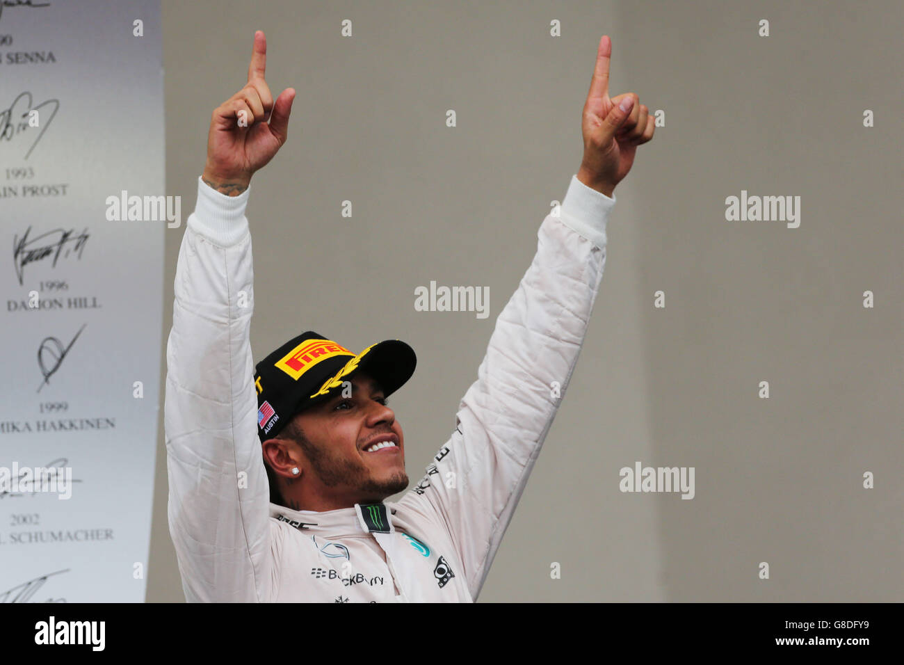 Mercedes' Lewis Hamilton celebrates his victory and winning the 2015 ...