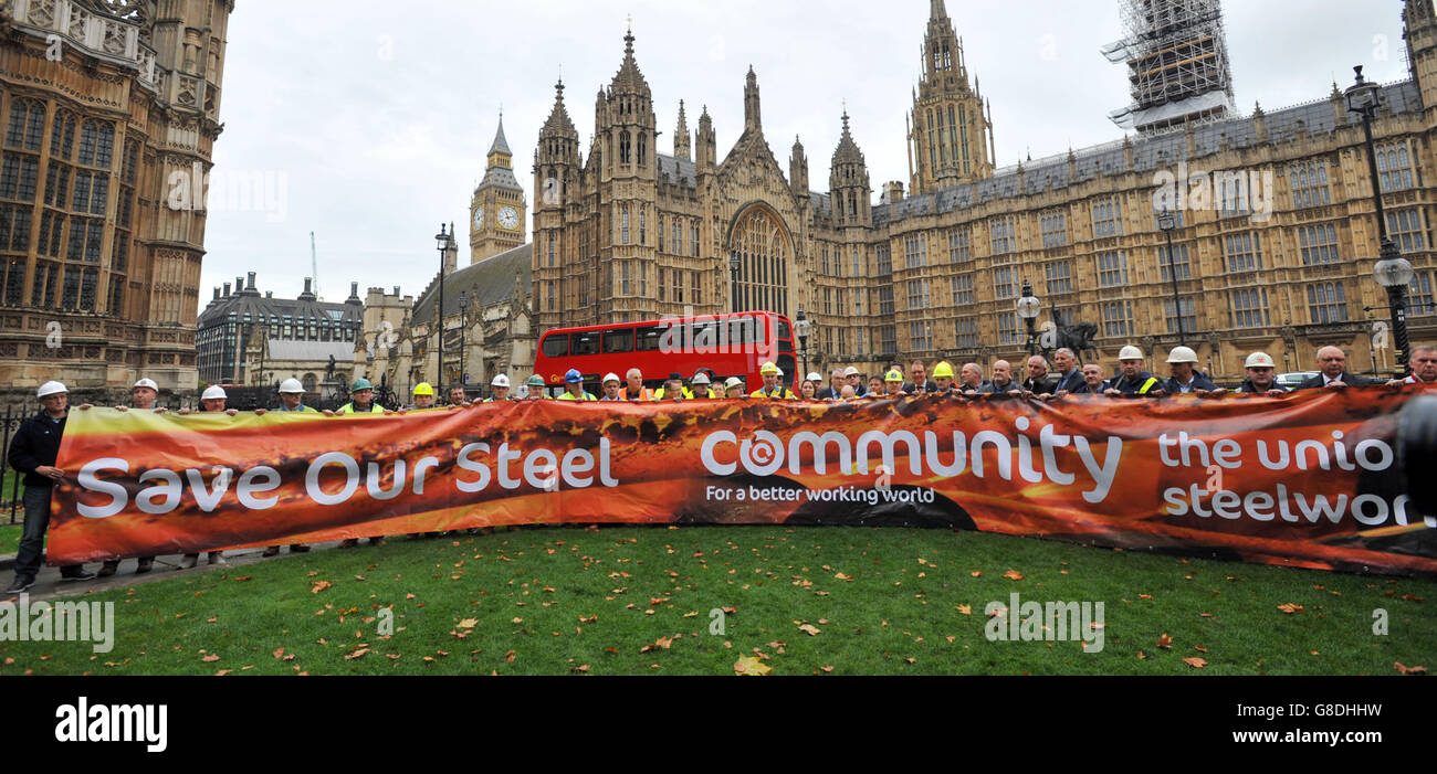 Steel workers unfurl a banner in parliament square hi-res stock ...
