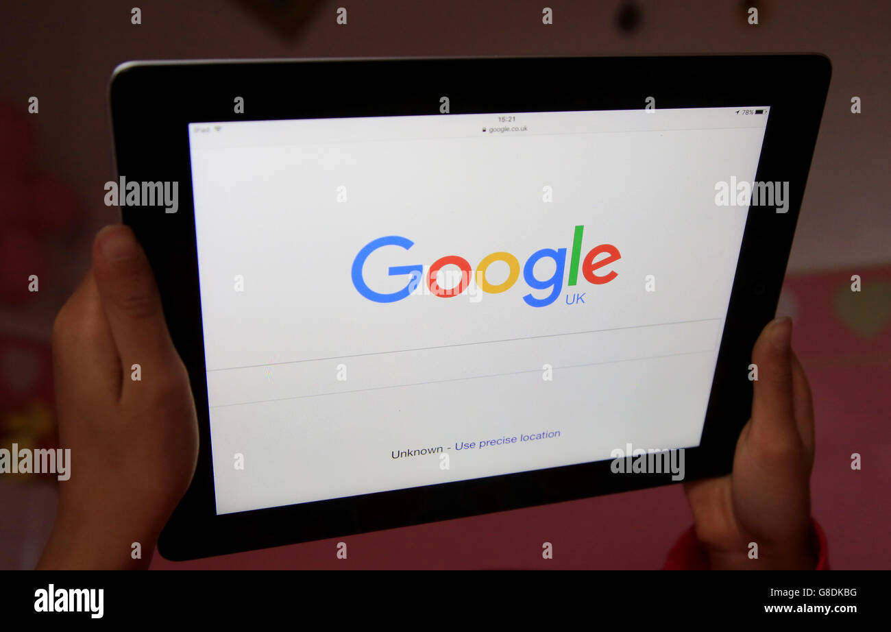 A view current google logo on tablet screen hi-res stock photography ...