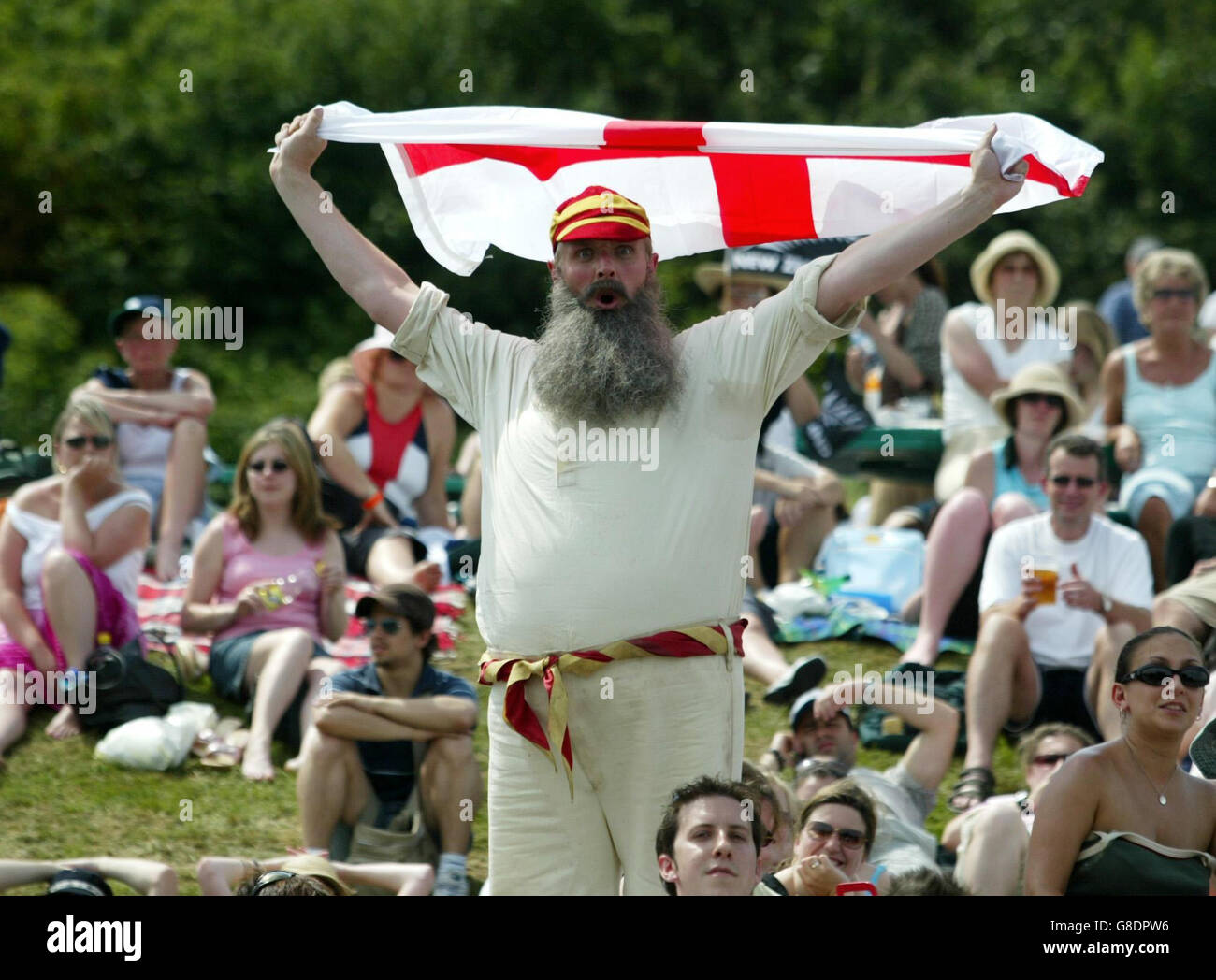 A tennis fan dressed as the legendary English batsman W.G.Grace shows ...