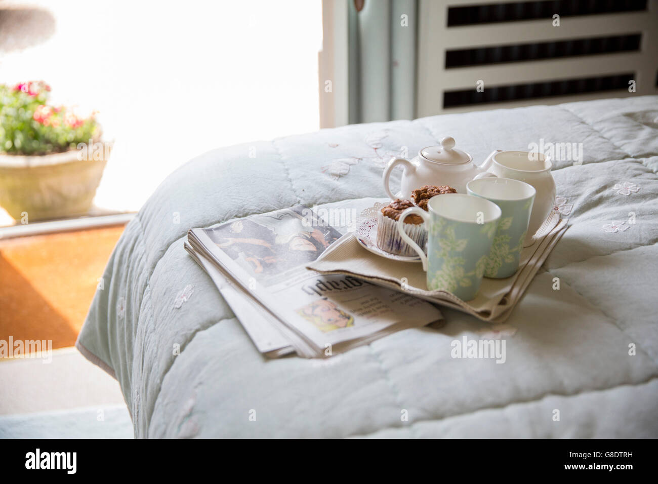 tea service on bed in country bed and breakfast Stock Photo - Alamy