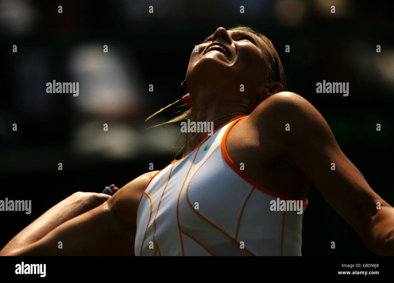 Russia's Maria Sharapova serves to France's Nathalie Dechy Stock Photo ...