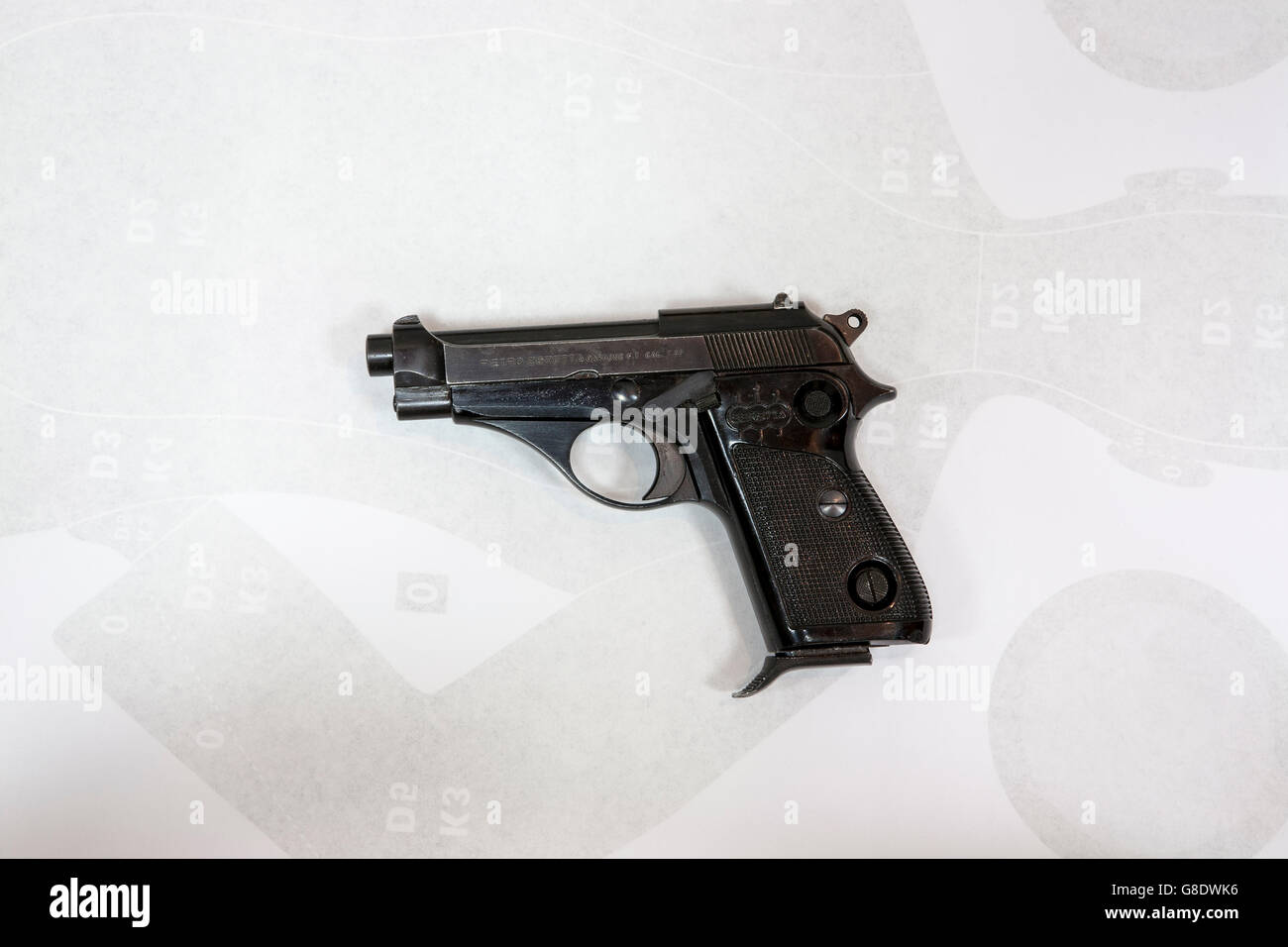 Beretta handgun cal. 7.65 pistol on a shooting target Stock Photo - Alamy