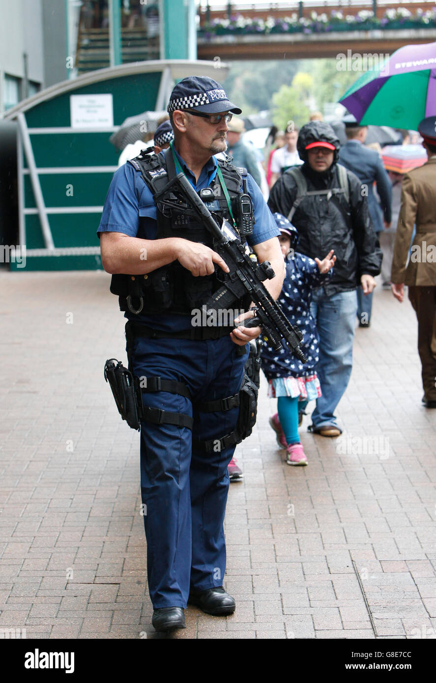 Police carrying guns hi-res stock photography and images - Alamy