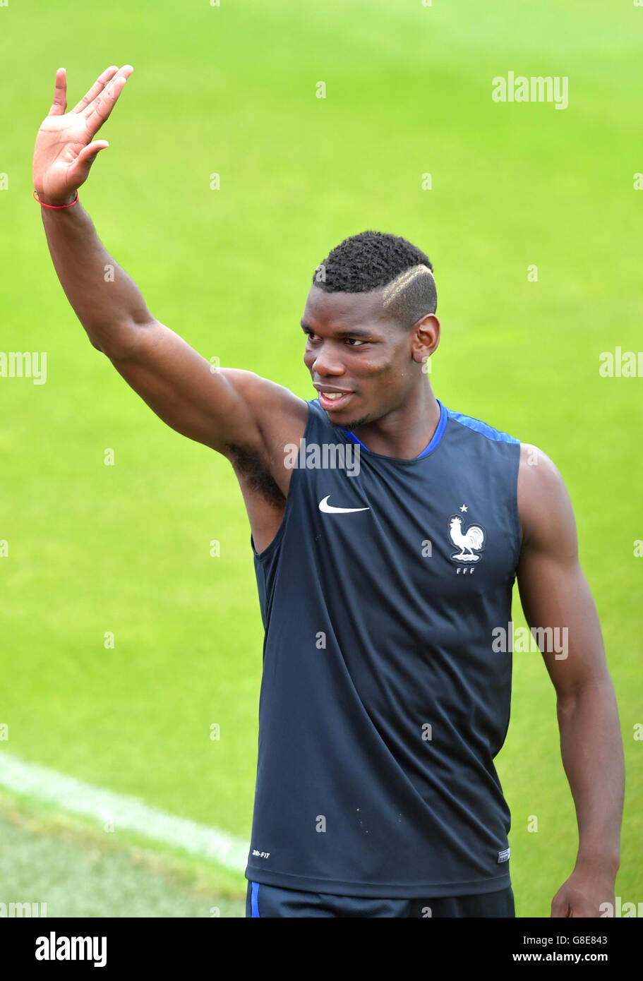 Paul Pogba of France waves during a public soccer training session at ...