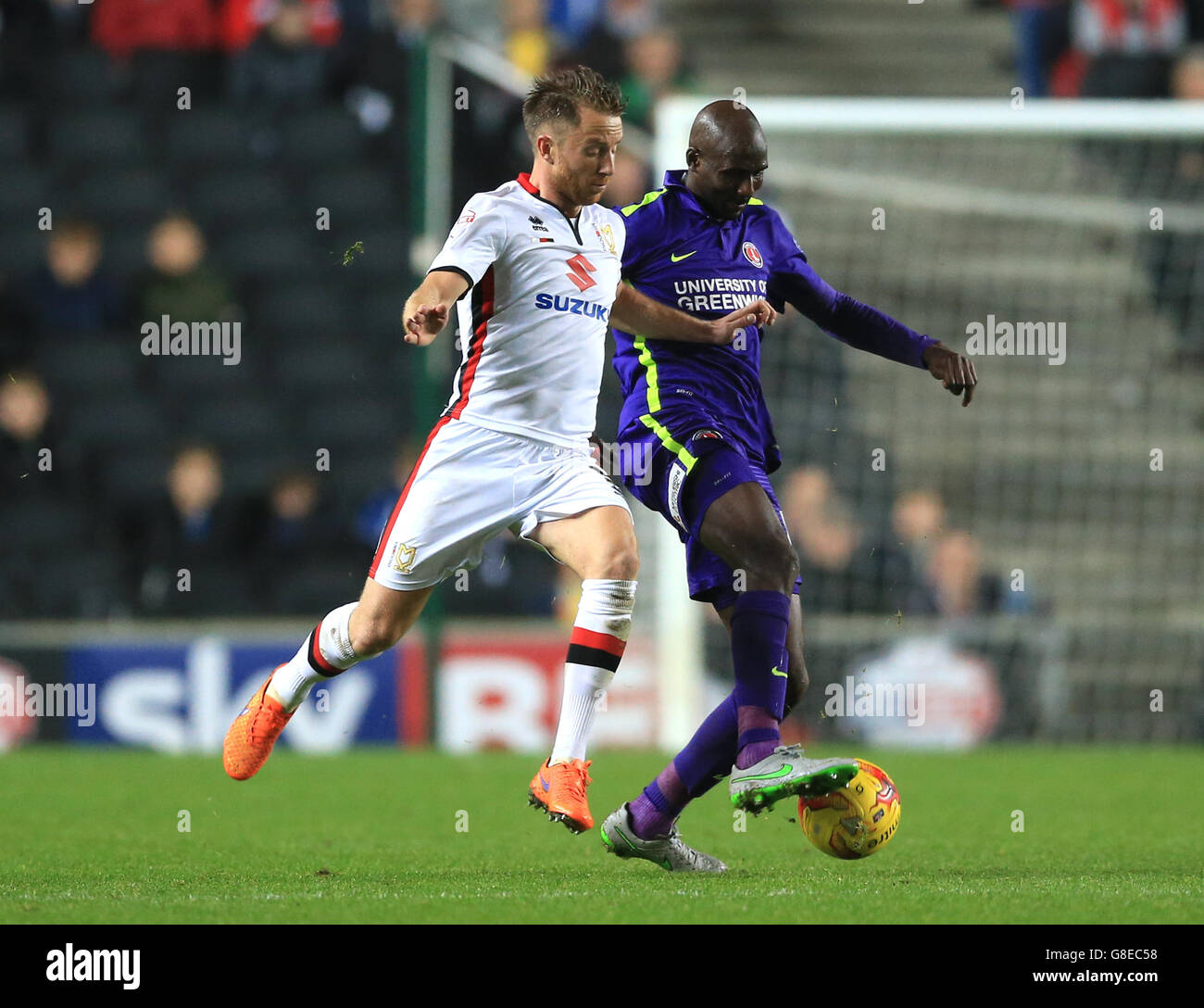 Milton Keynes Dons' Dean Bowditch (left) and Charlton Athletic's Alou ...