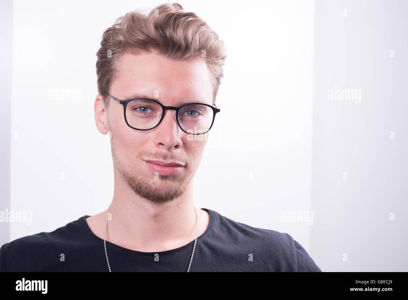 Portrait young smart Professional looking very sceptical Stock Photo ...