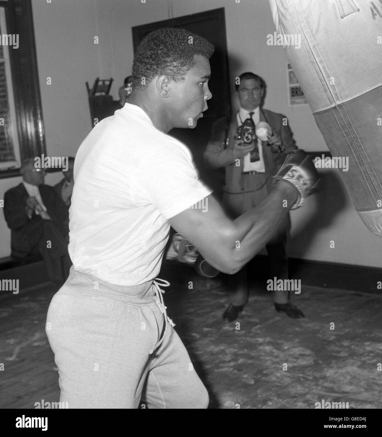 Muhammad Ali, the World Heavyweight Champion, in training. Ali is in ...