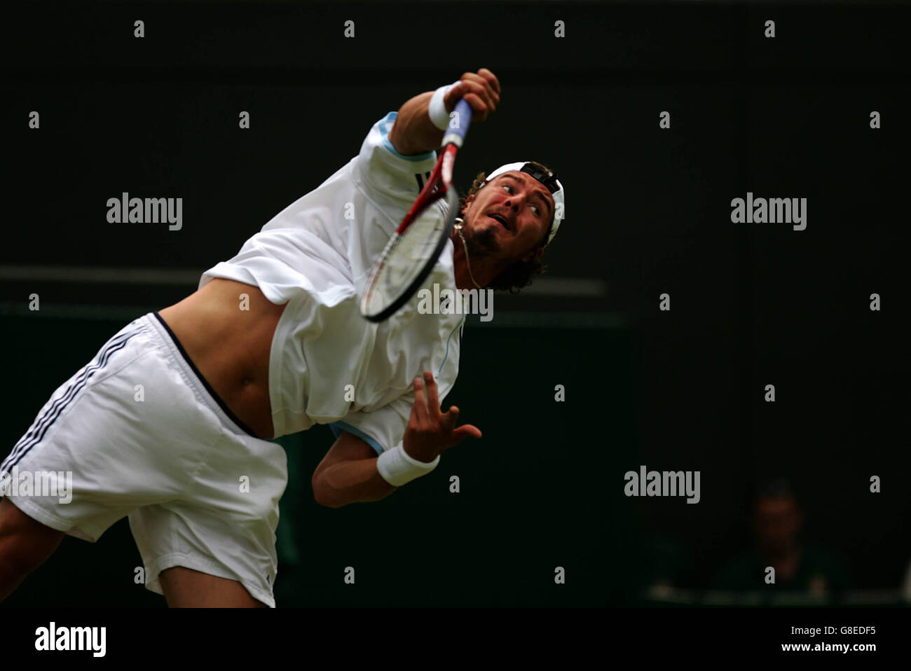 Russia's Marat Safin serves to Spain's Feliciano Lopez Stock Photo - Alamy