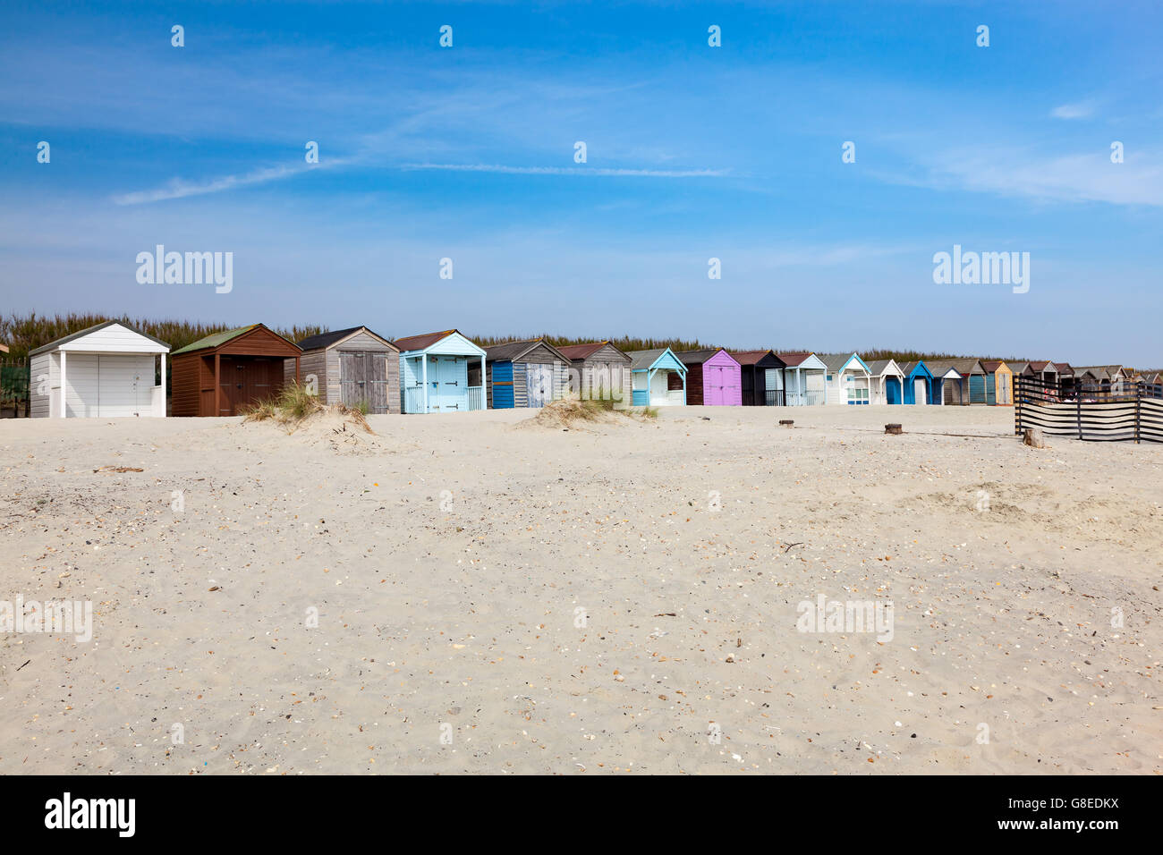 Traditional beach huts on fine golden sand at West Wittering Beach West ...