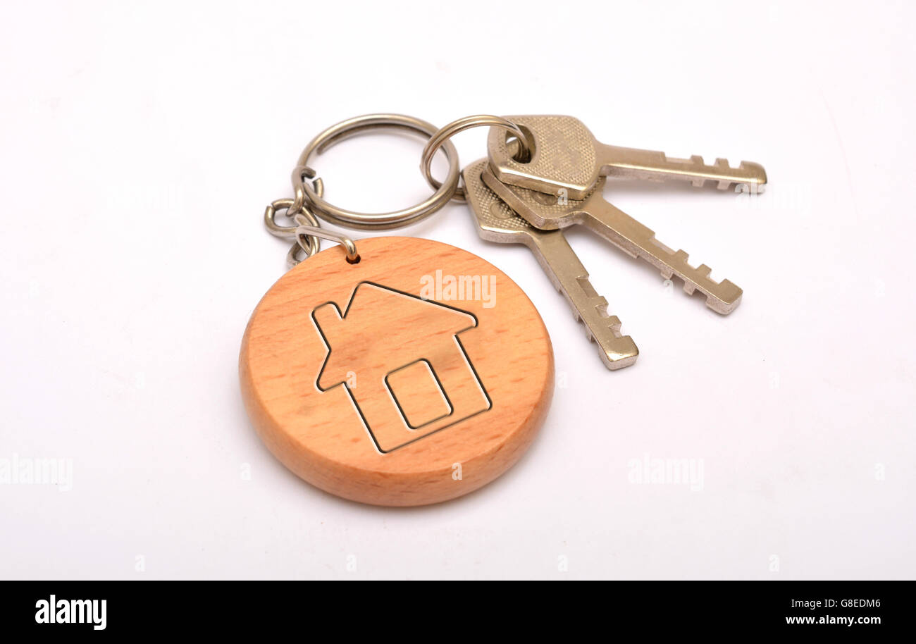 Metal door keys with house-shape key ring isolated on white background ...