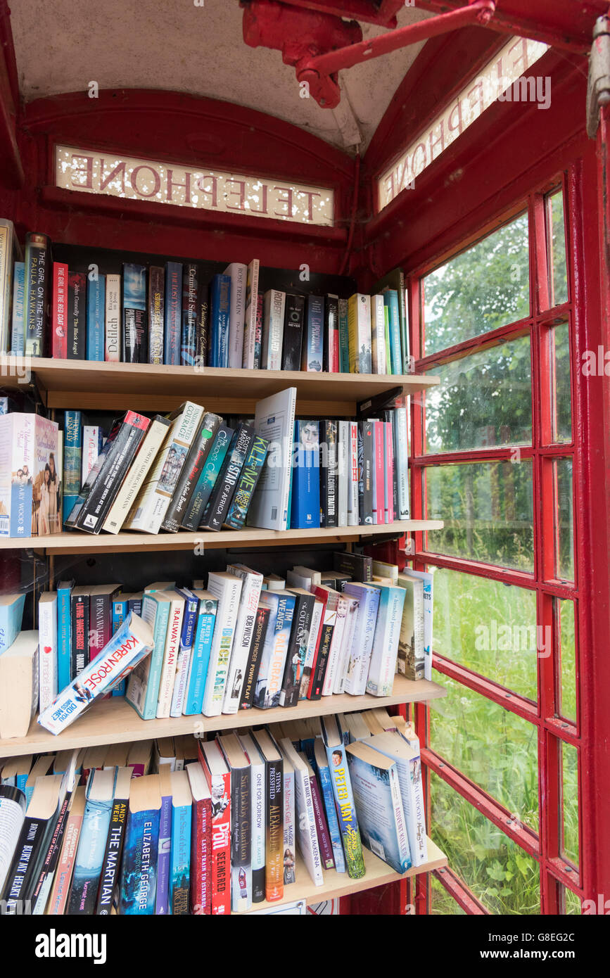 A community library in a disused red telephone box in the UK Stock ...