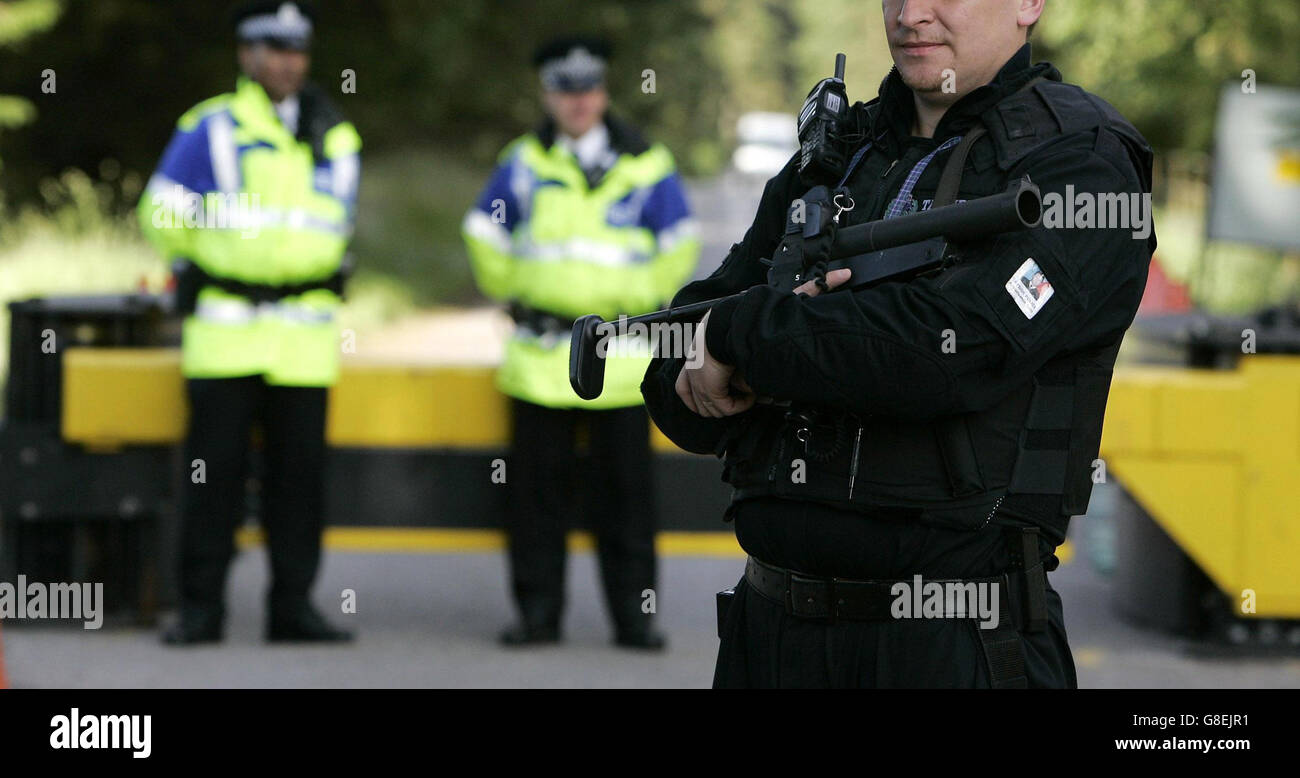 Armed Police officers at a checkpoint near to the Gleneagles estate ...