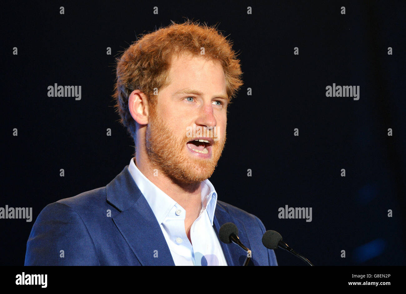 Prince Harry speaks during a concert hosted by his charity Sentebale in ...