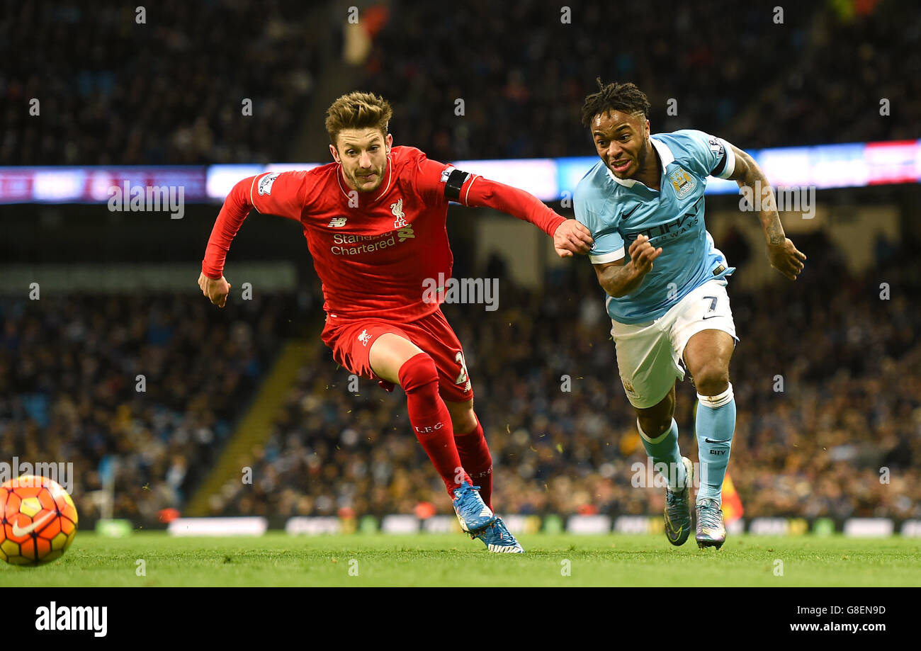 Manchester City's Raheem Sterling (right) and Liverpool's Adam Lallana ...