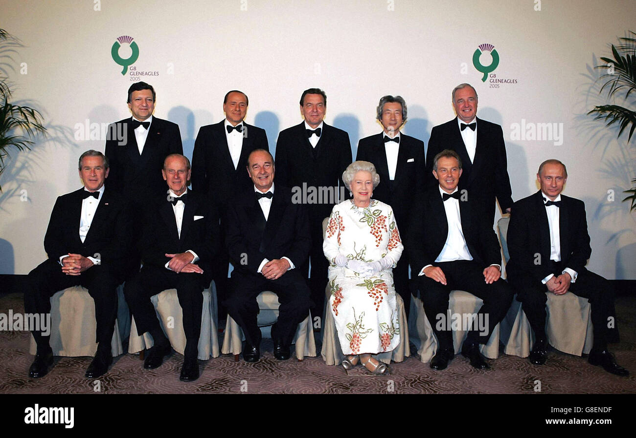 European Commissioner Jose Manuel Barroso (back row, from left) stands ...